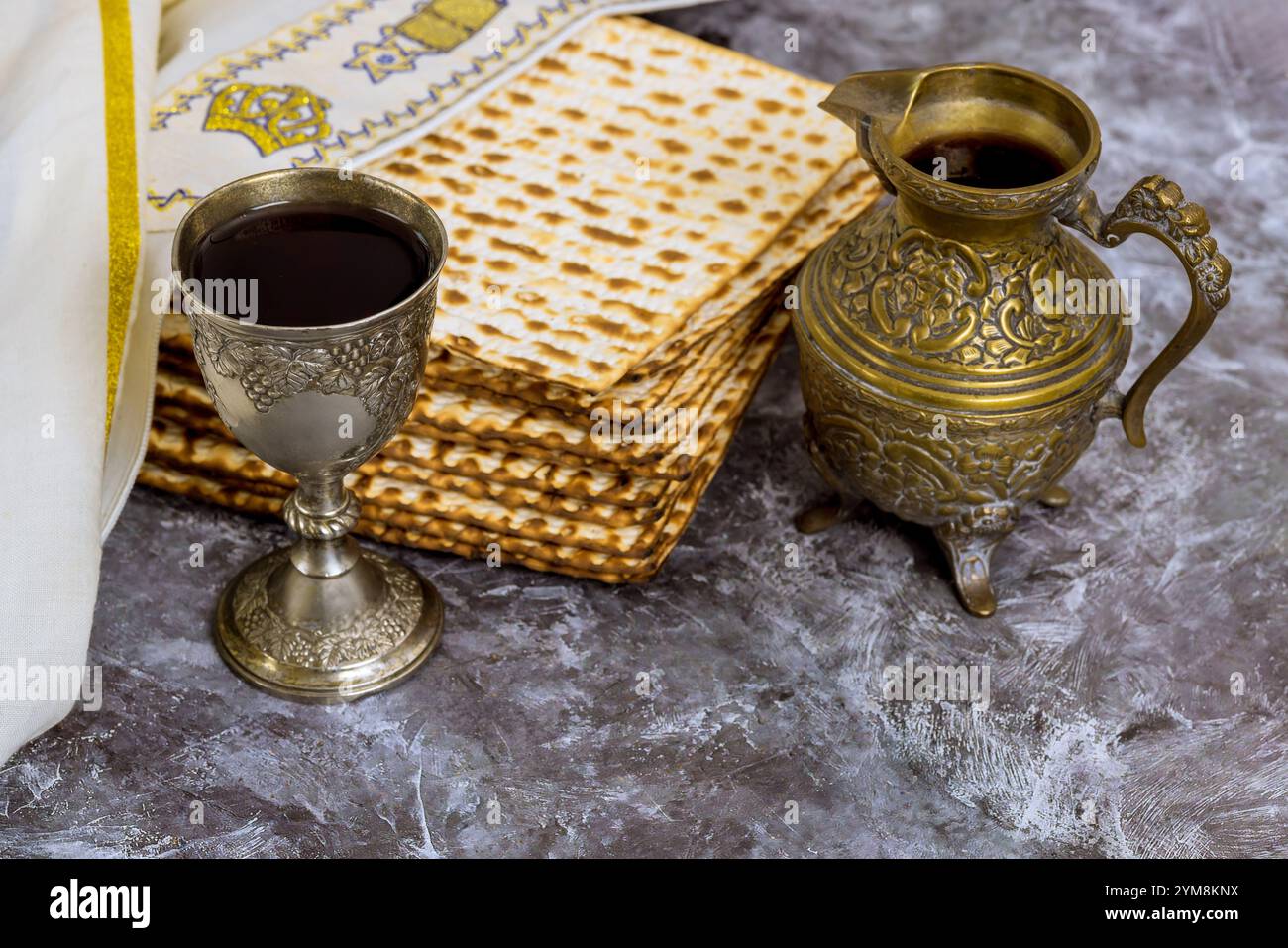 Matzah is stacked decorative wine cup an this setting reflects cultural ...