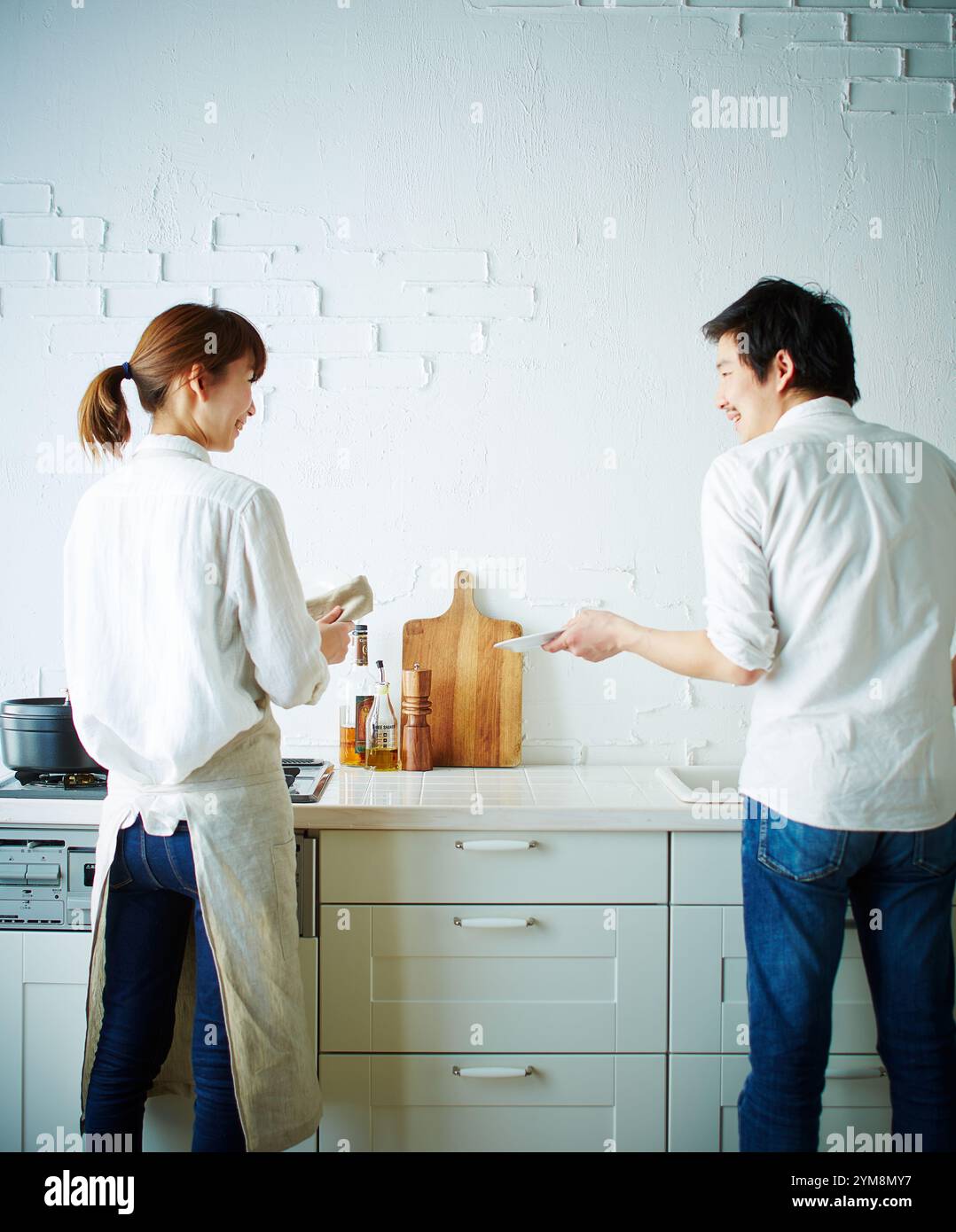 Person washing dishes in stylish hi-res stock photography and images ...