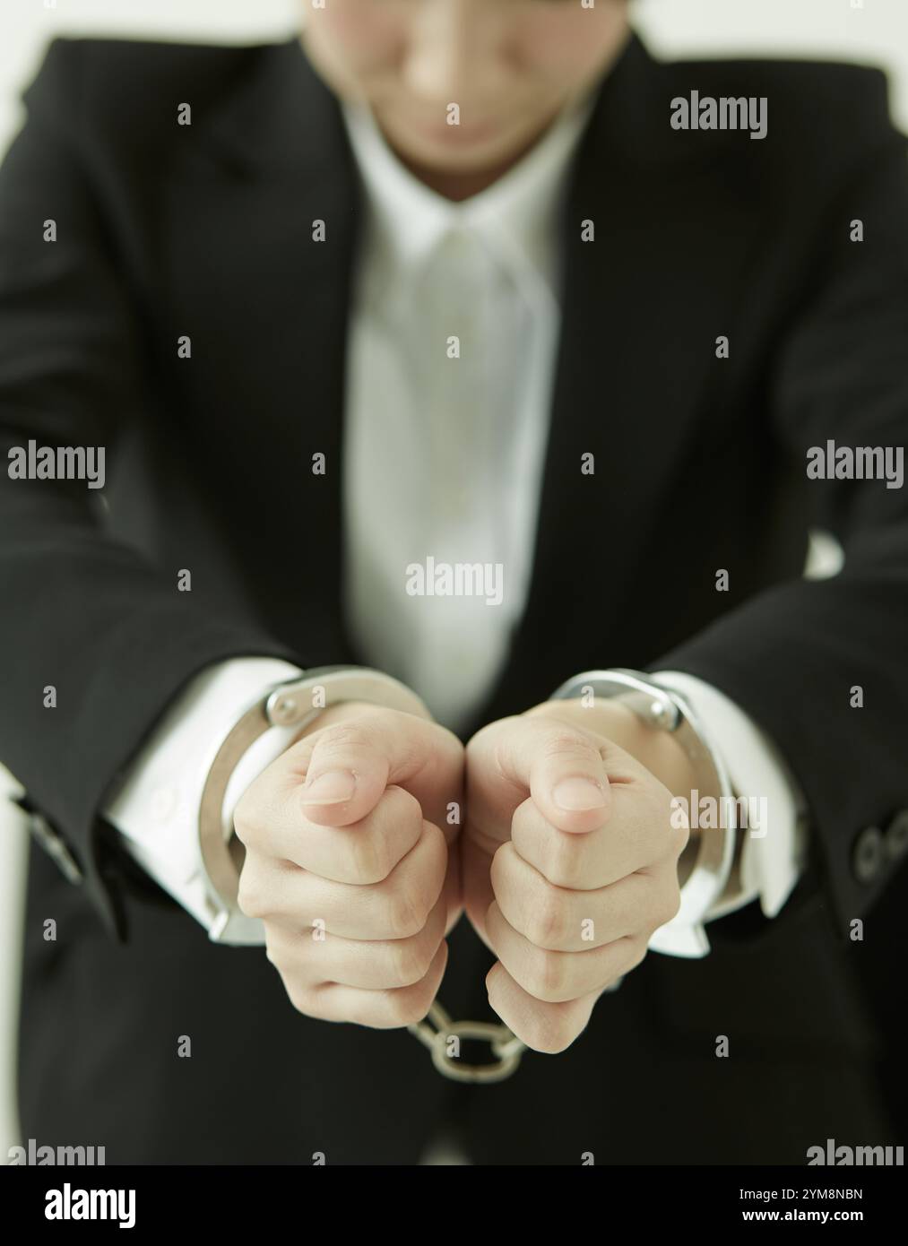 Woman with handcuffs hi-res stock photography and images - Alamy
