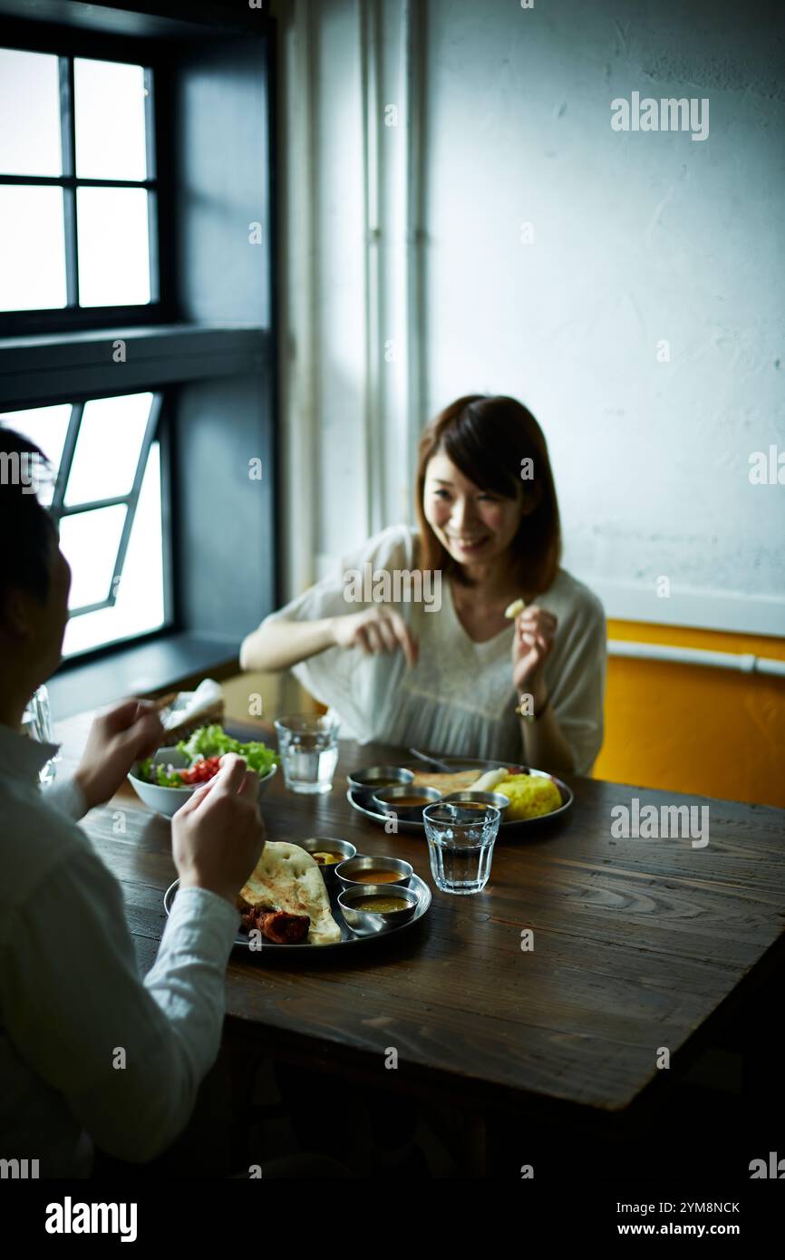 Indian couple eating hi-res stock photography and images - Alamy
