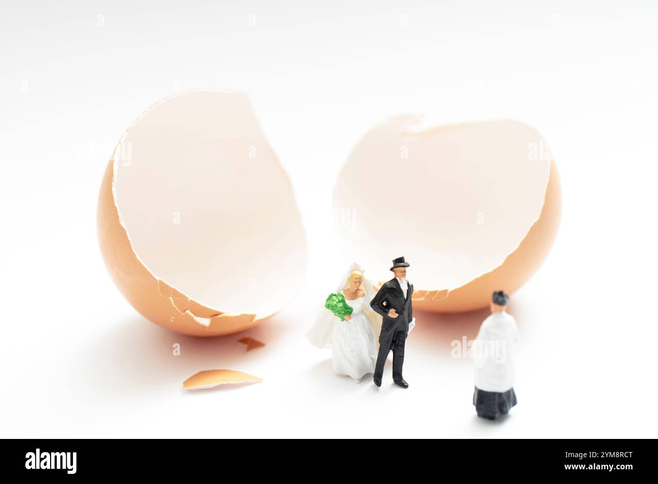 Egg and miniature doll Stock Photo - Alamy
