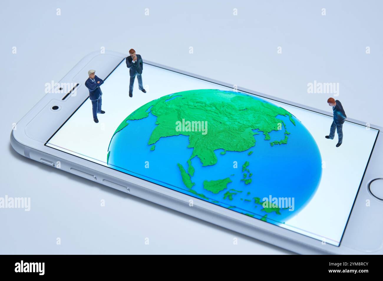 World map and miniature doll Stock Photo - Alamy