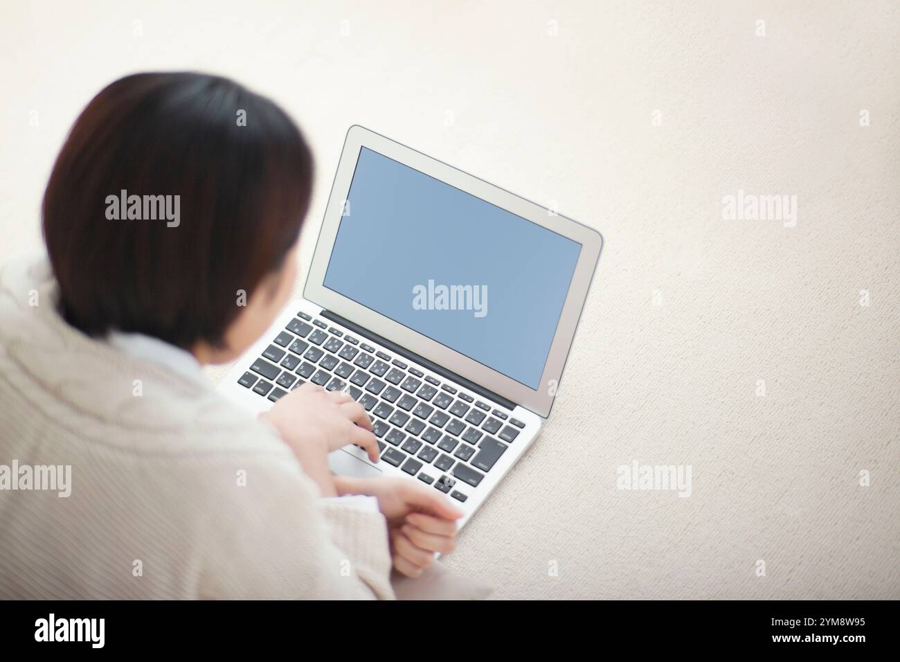 Woman in her 20s with laptop Stock Photo - Alamy