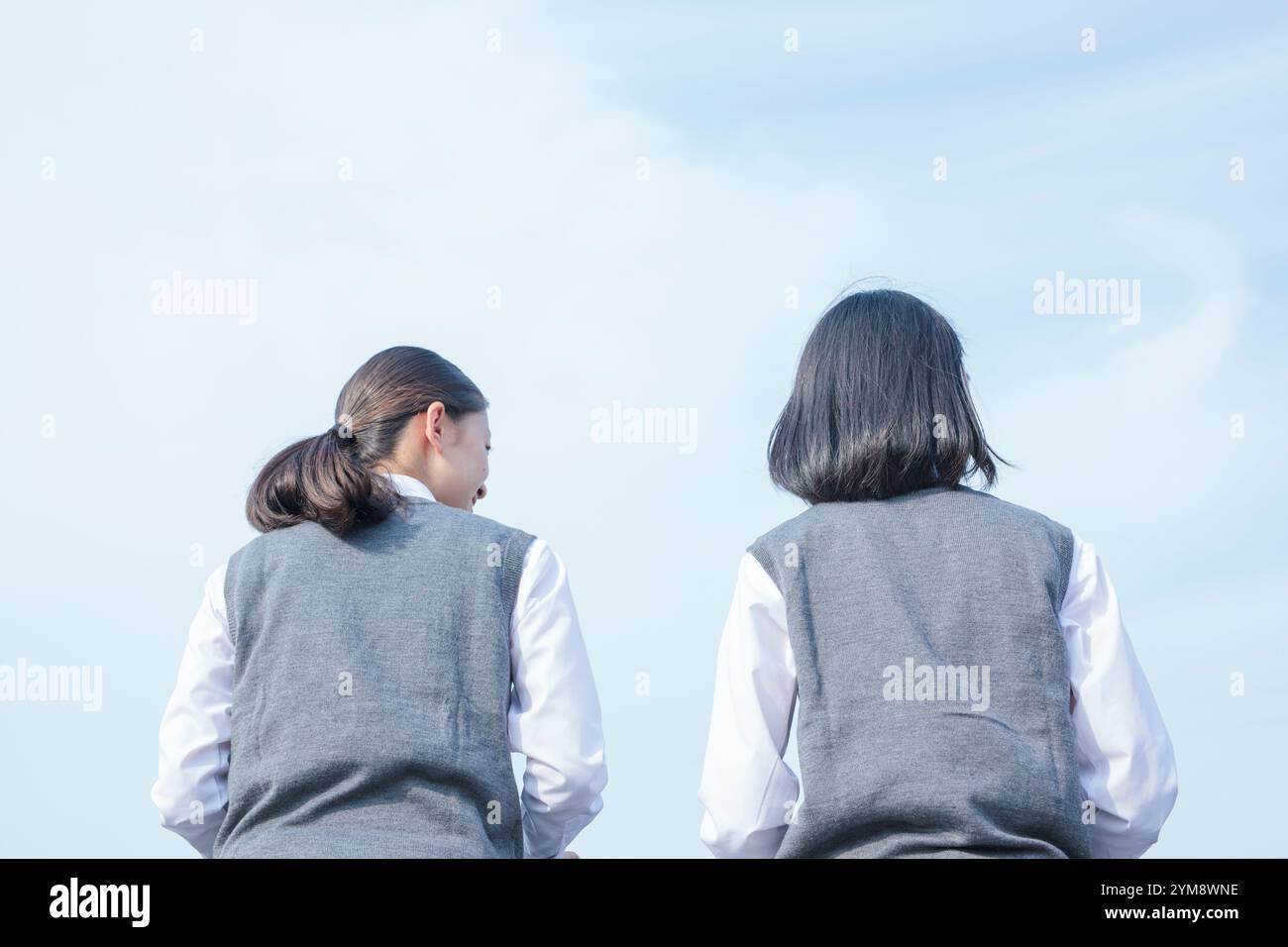School girl back view uniform hi-res stock photography and images - Alamy