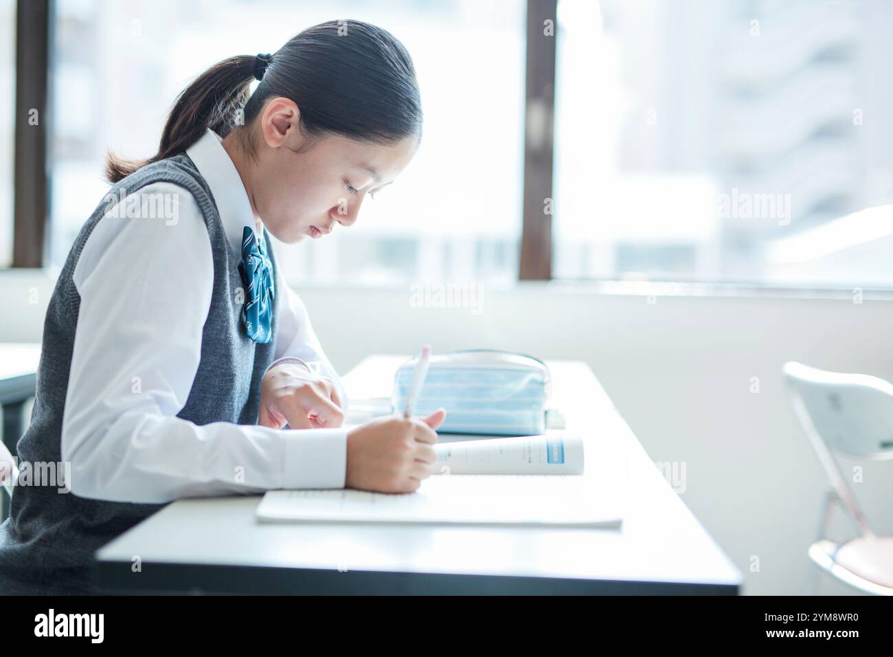 Female student studying Stock Photo - Alamy