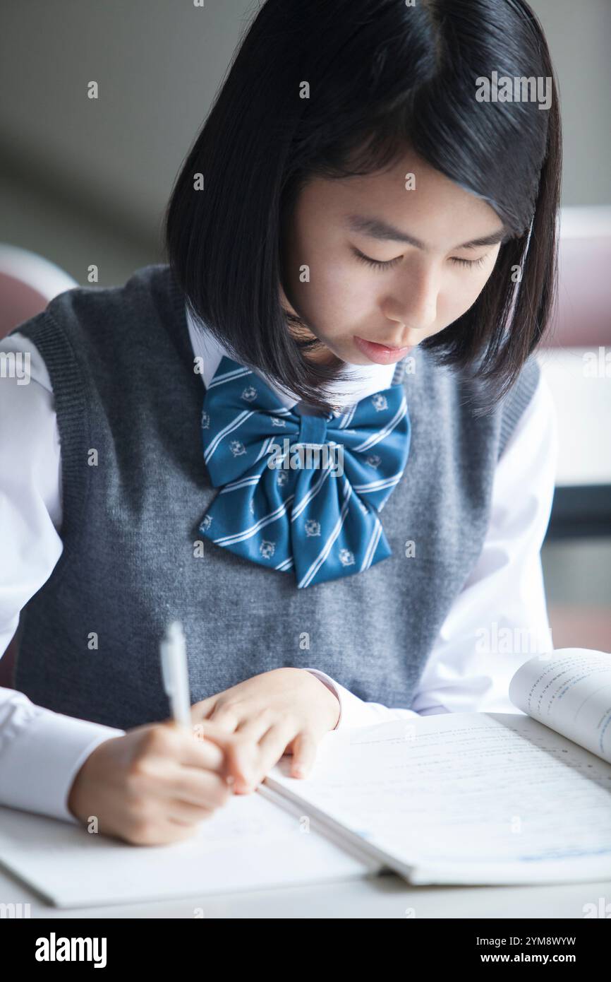 Female student studying Stock Photo - Alamy