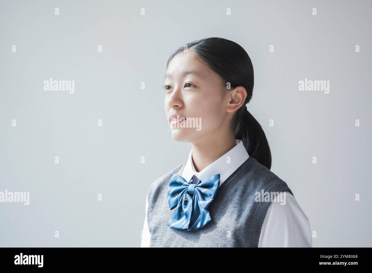 Female student gazing distance hi-res stock photography and images - Alamy