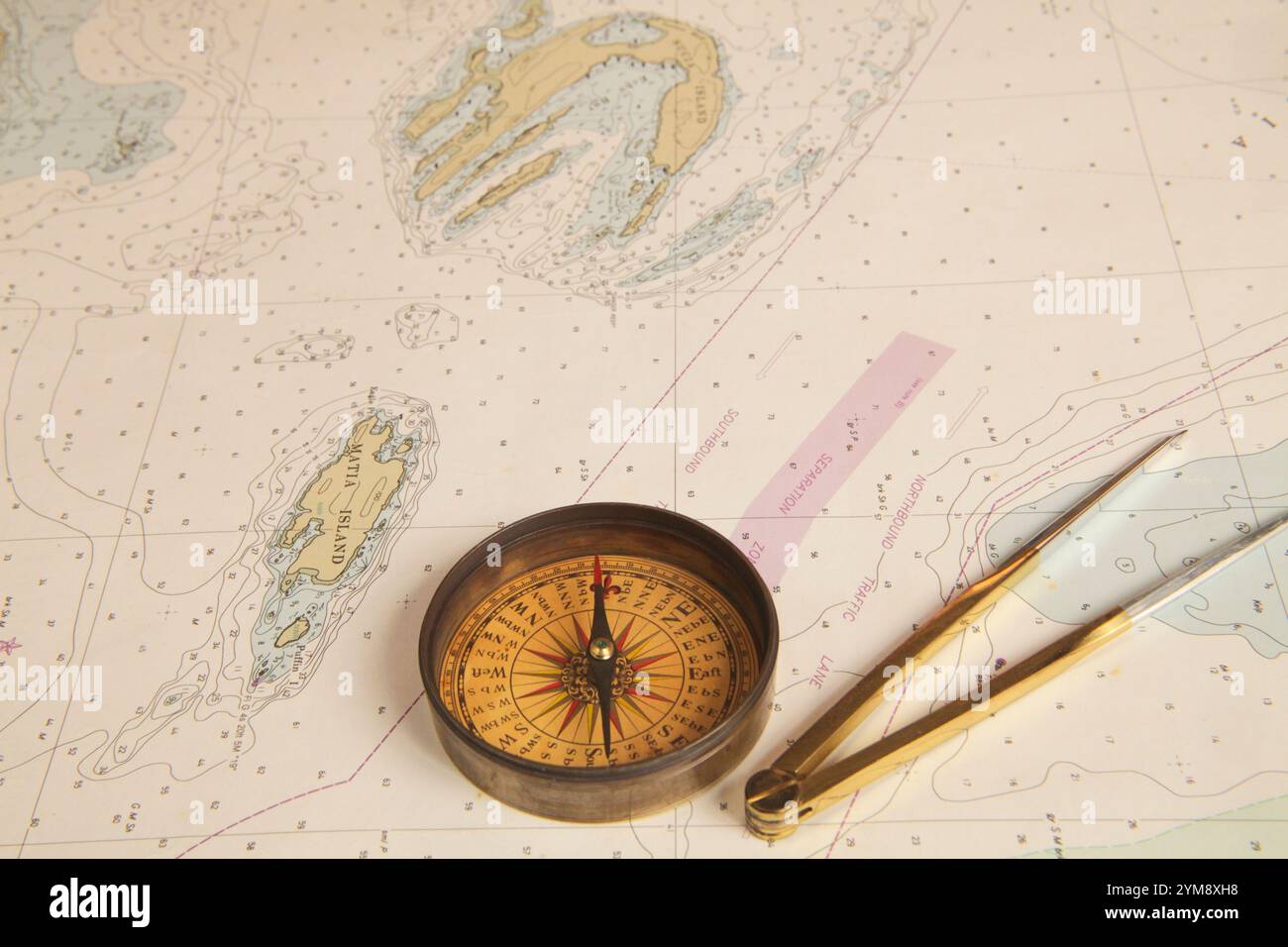 Map and compass Stock Photo - Alamy