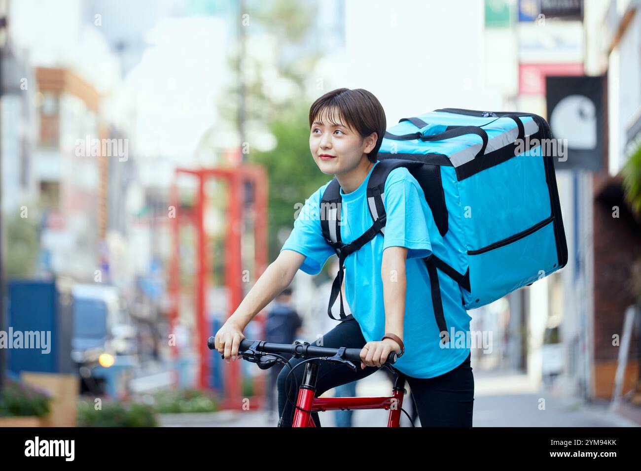 Japanese woman carrying backpack hi-res stock photography and images - Alamy