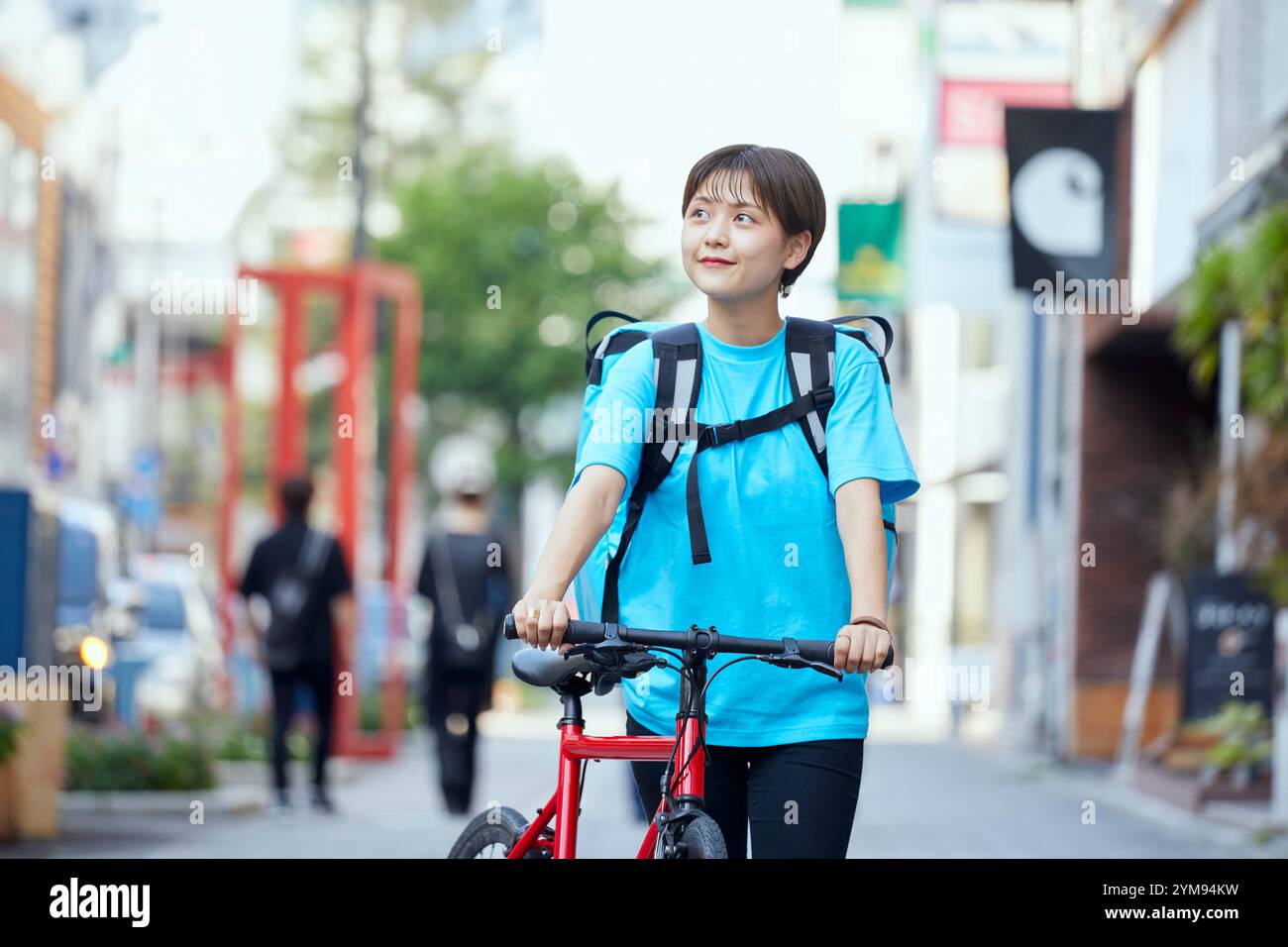 Japanese woman carrying backpack hi-res stock photography and images - Alamy