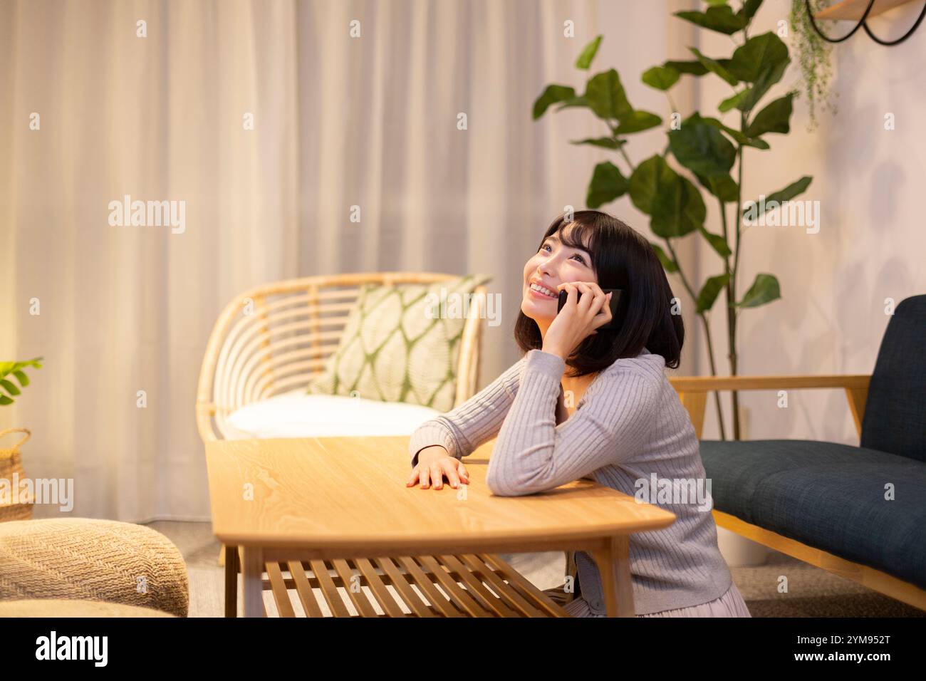 Relaxing sofa phone night hi-res stock photography and images - Alamy