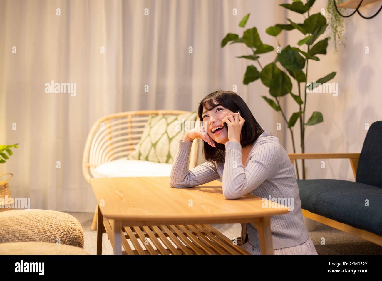 Relaxing sofa phone night hi-res stock photography and images - Alamy