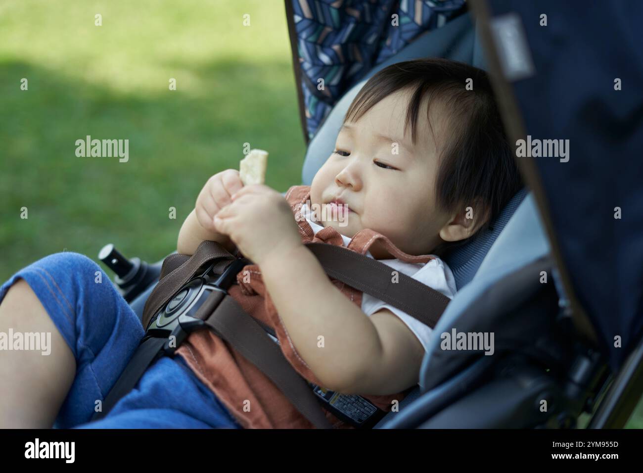 Cute Japanese baby in stroller Stock Photo - Alamy