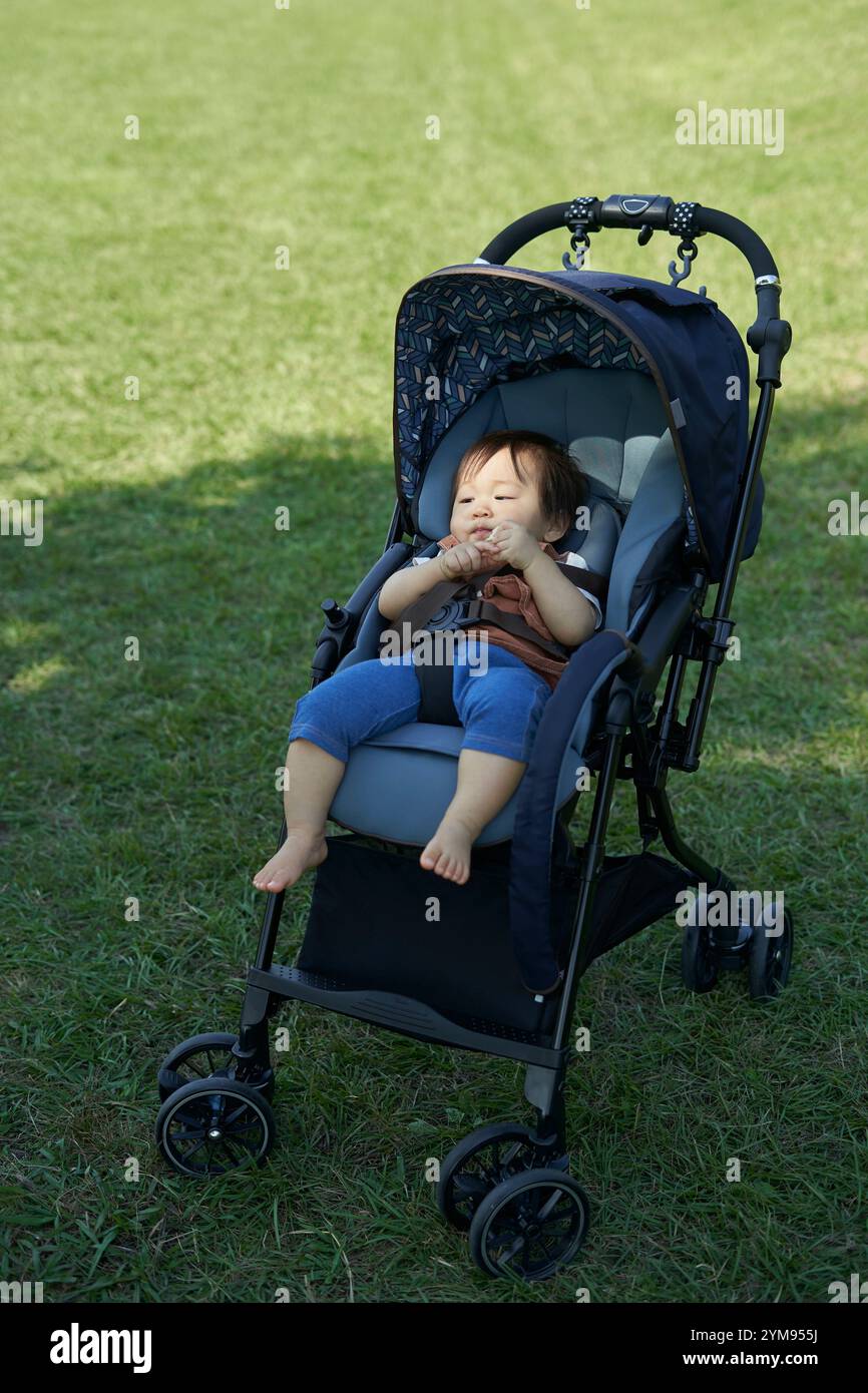 Cute Japanese baby in stroller Stock Photo - Alamy