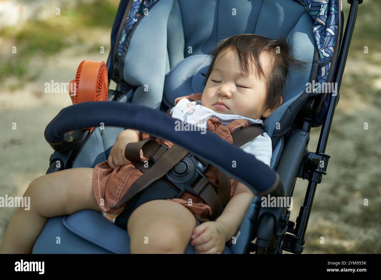 Cute Japanese baby in stroller Stock Photo - Alamy