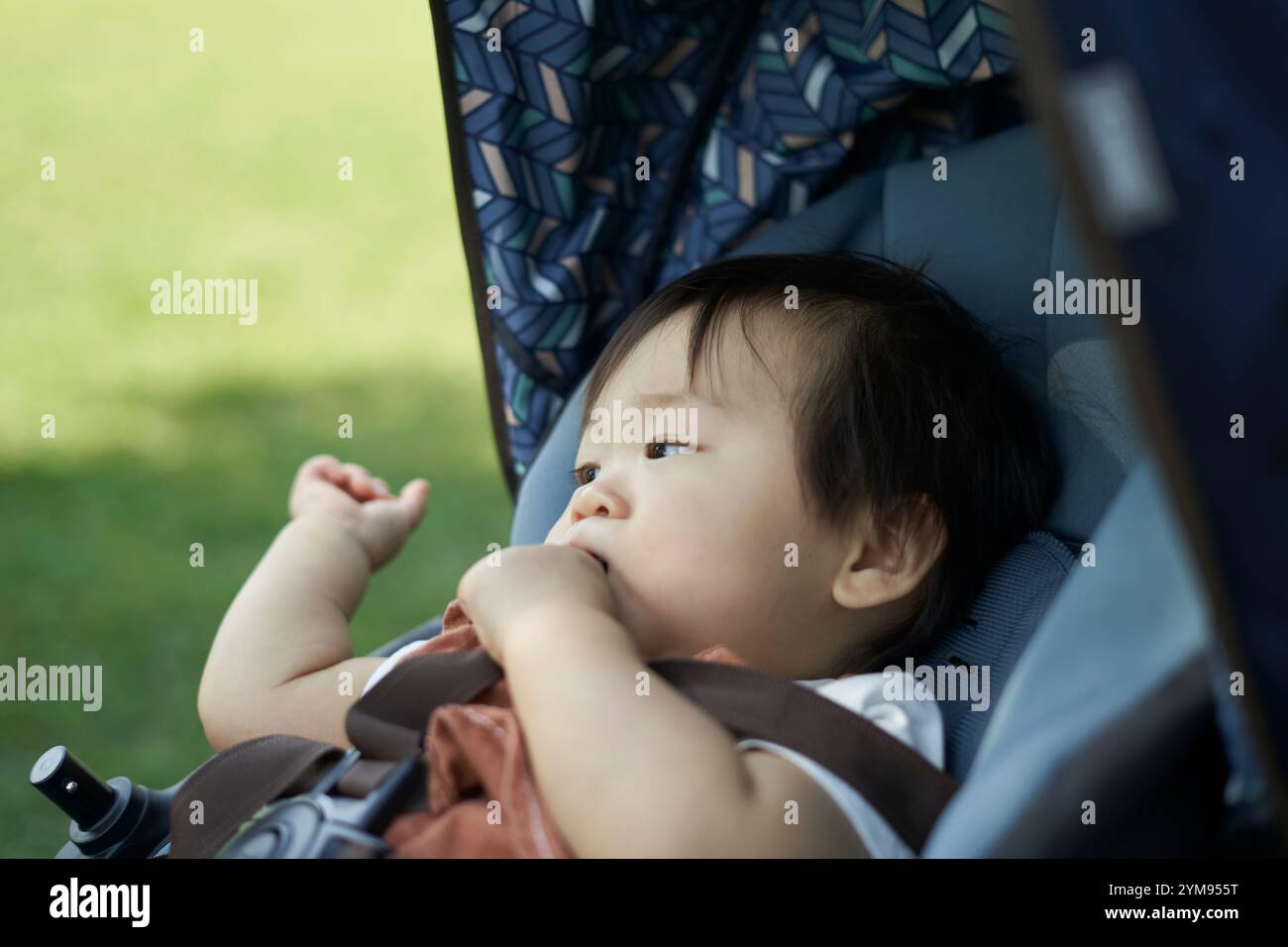 Cute Japanese baby in stroller Stock Photo - Alamy