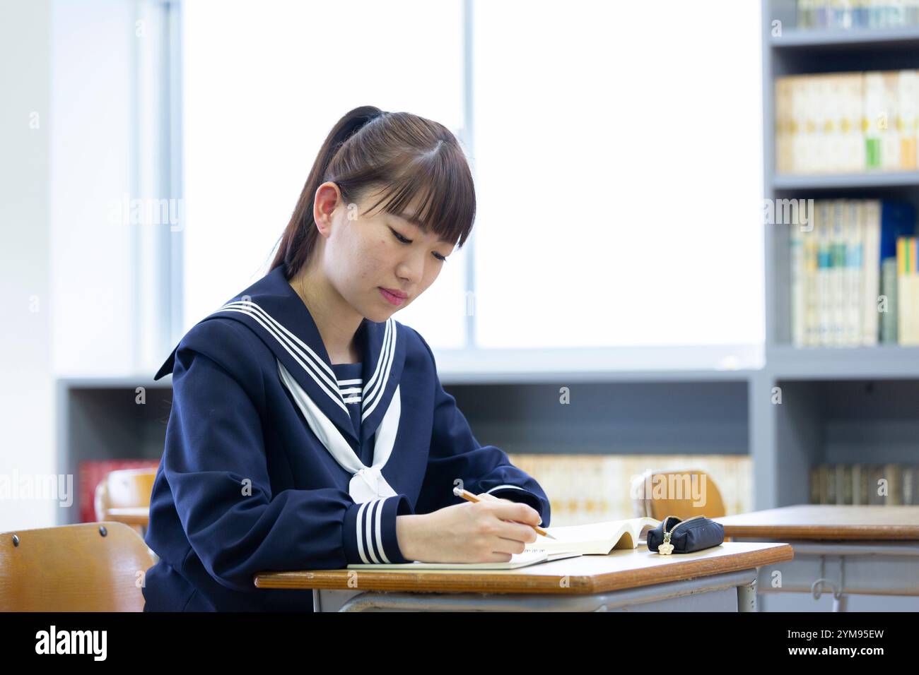 Young Japanese students studying in a classroom Stock Photo - Alamy