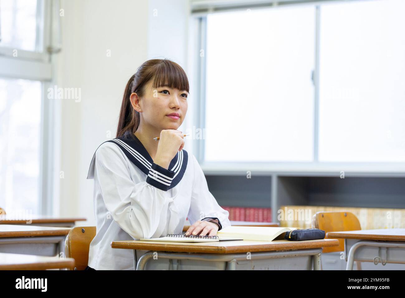 Young Japanese students studying in a classroom Stock Photo - Alamy