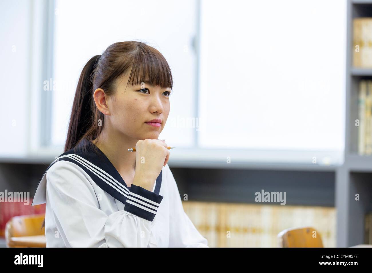Young Japanese students studying in a classroom Stock Photo - Alamy