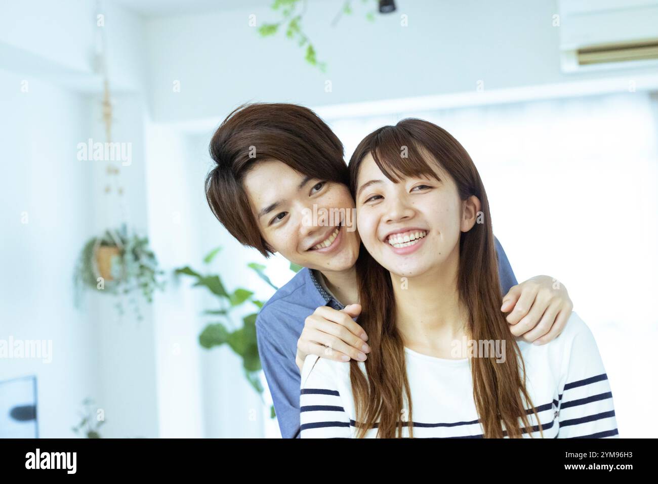 A Japanese man and woman who get on well Stock Photo - Alamy