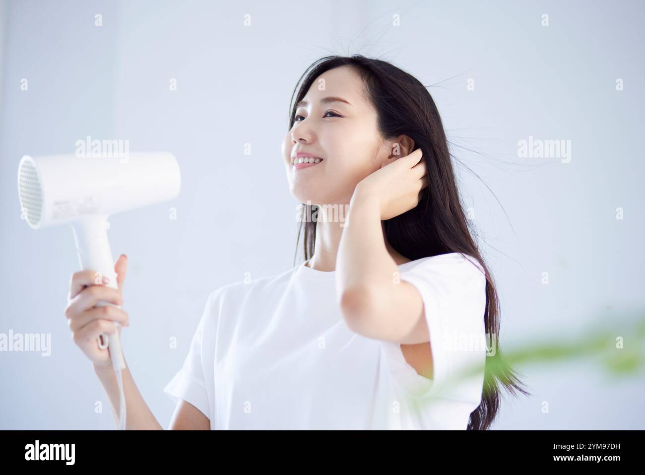 Drying hair at home hi-res stock photography and images - Alamy