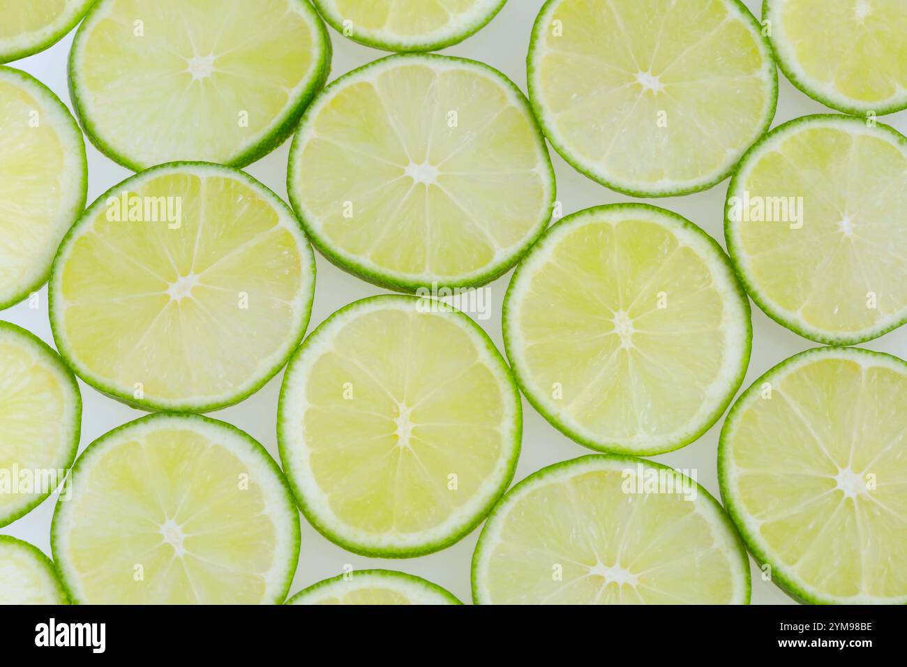Image of lime slices laid flat Stock Photo - Alamy