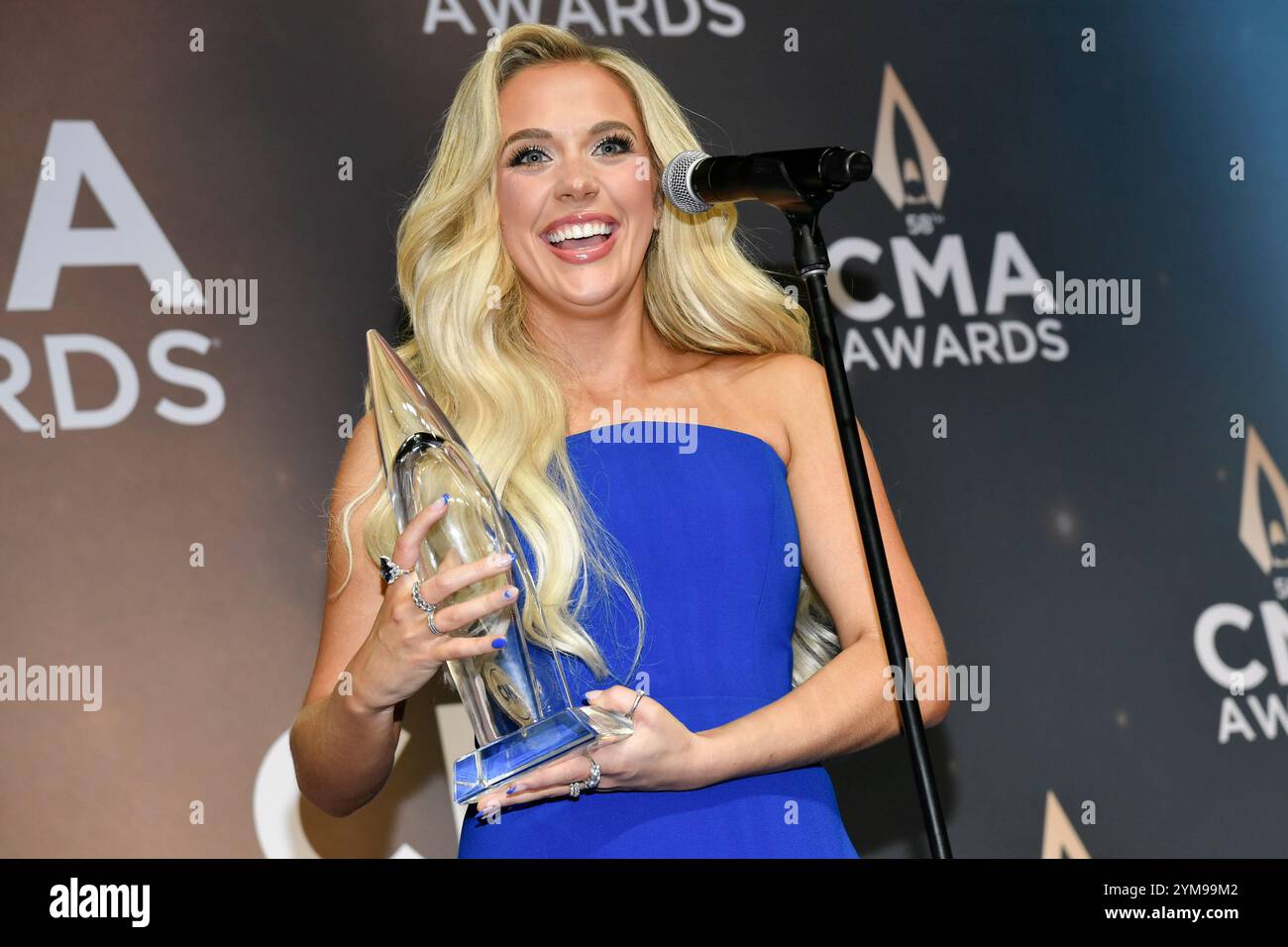 Megan Moroney poses with the award for new artist of the year in the ...