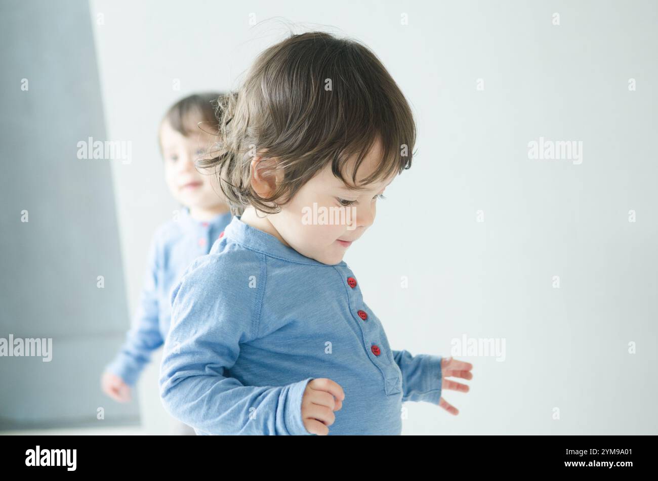 Two boys walking home hi-res stock photography and images - Alamy