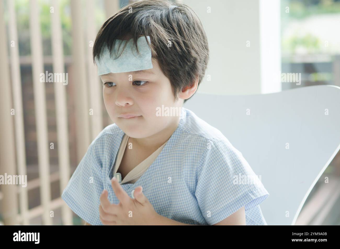 Child with fever Stock Photo - Alamy