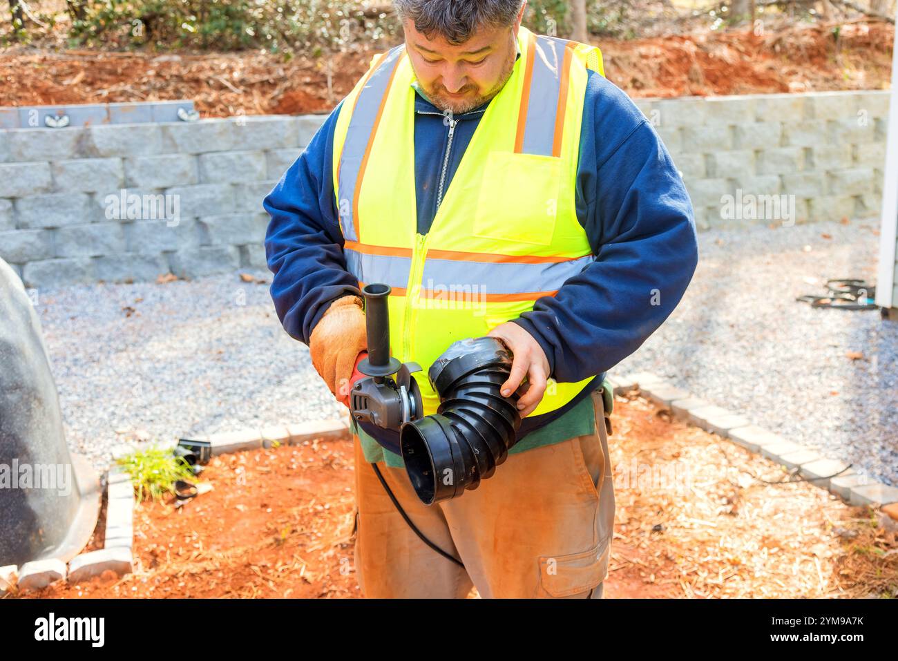 Contractor wears safety vest hi-res stock photography and images - Alamy