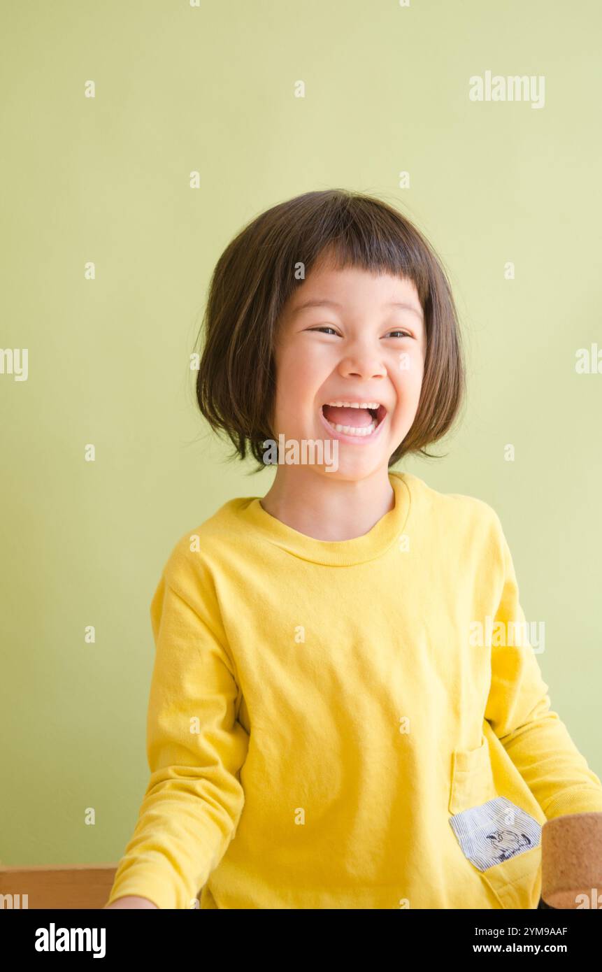 Girl laughing loudly Stock Photo - Alamy