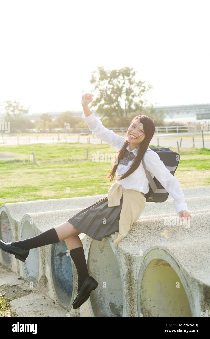 Female student posing Stock Photo - Alamy