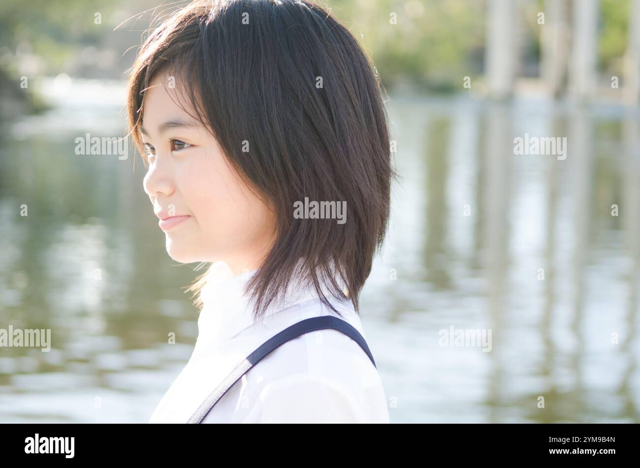 Primary schools girl in profile Stock Photo - Alamy