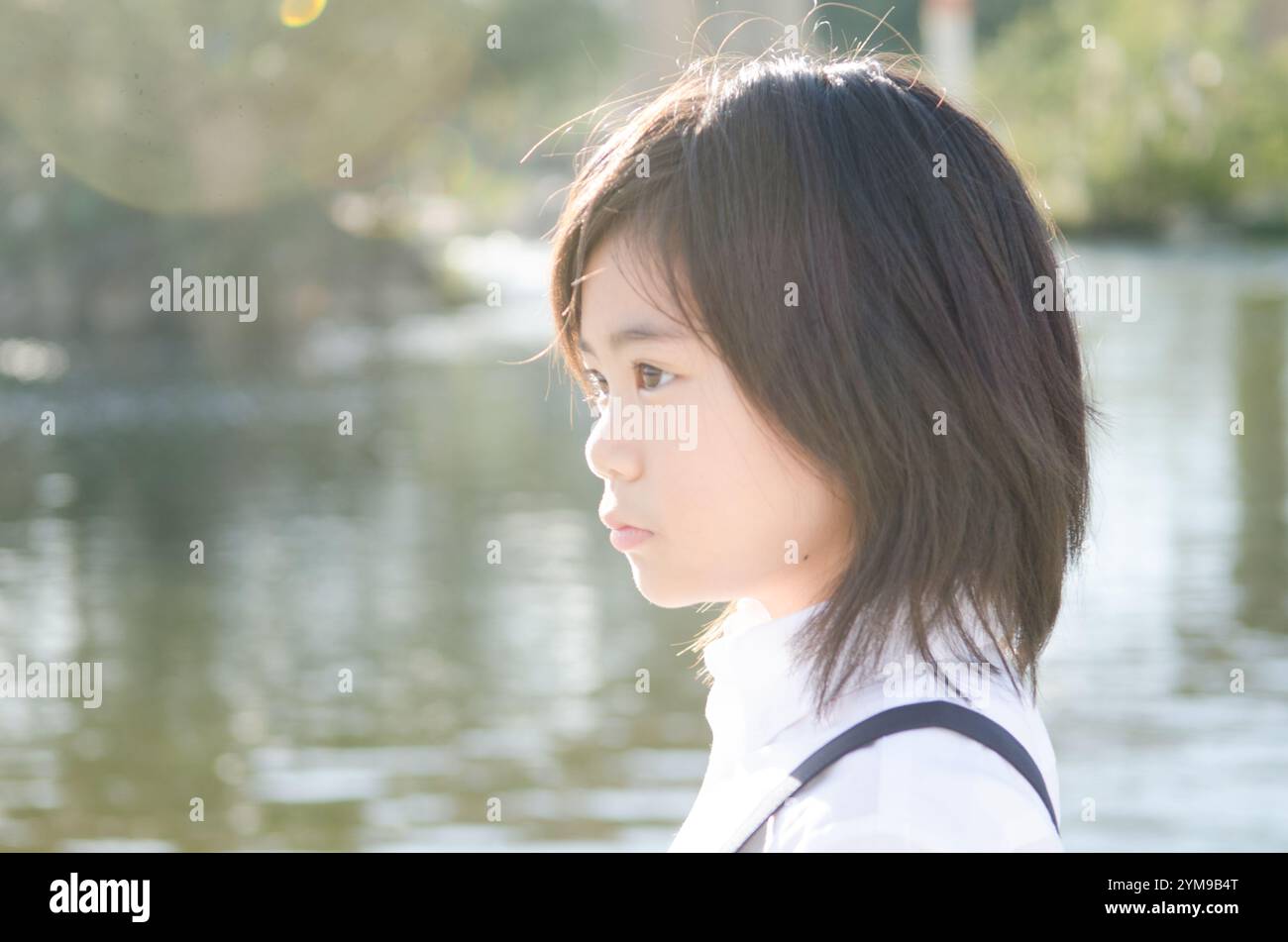 Primary schools girl in profile Stock Photo - Alamy