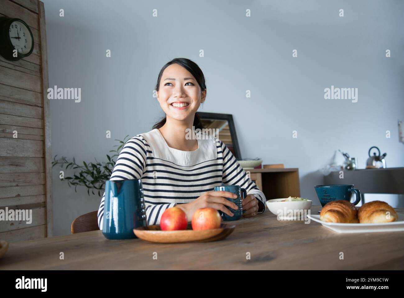 Breakfast scenery and laughing woman Stock Photo - Alamy