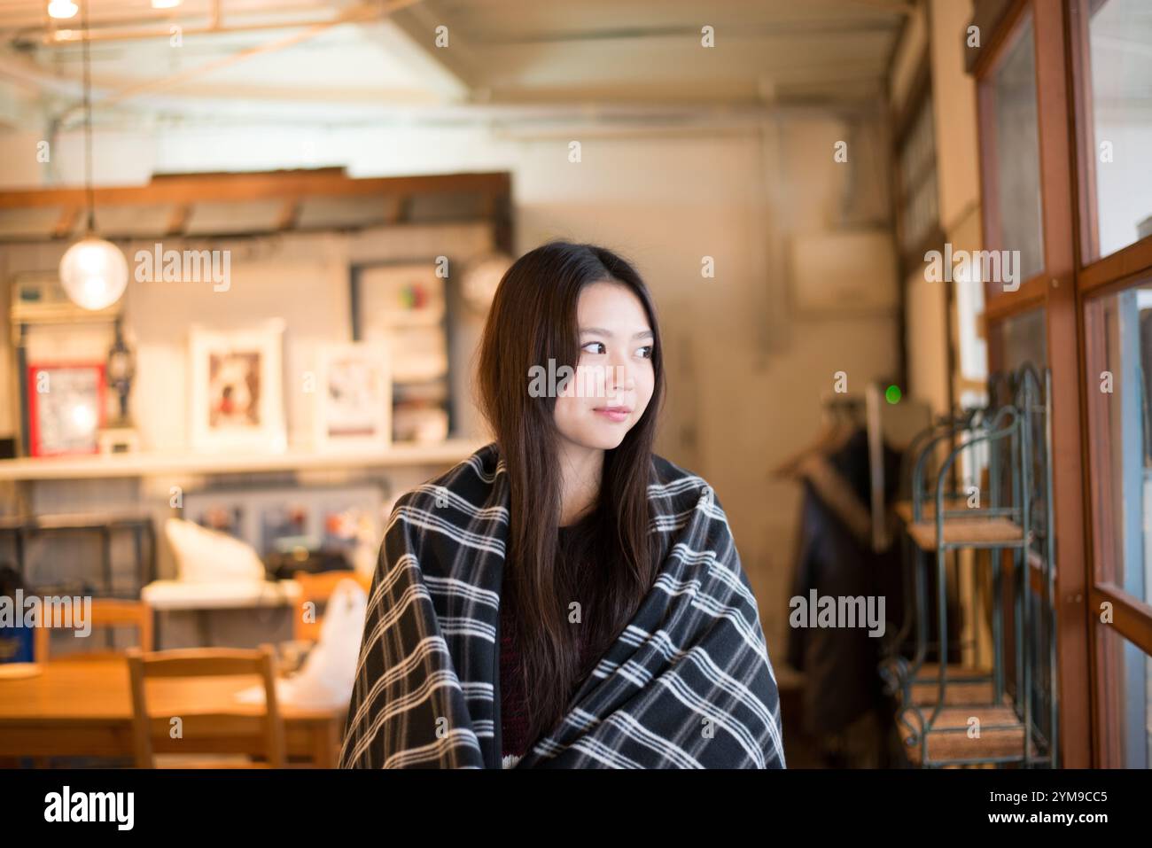 Woman wrapped in a stole Stock Photo - Alamy