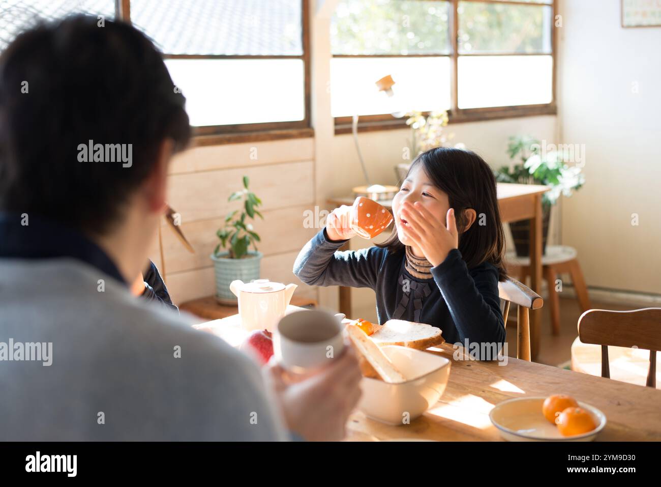 Family eating breakfast Stock Photo - Alamy