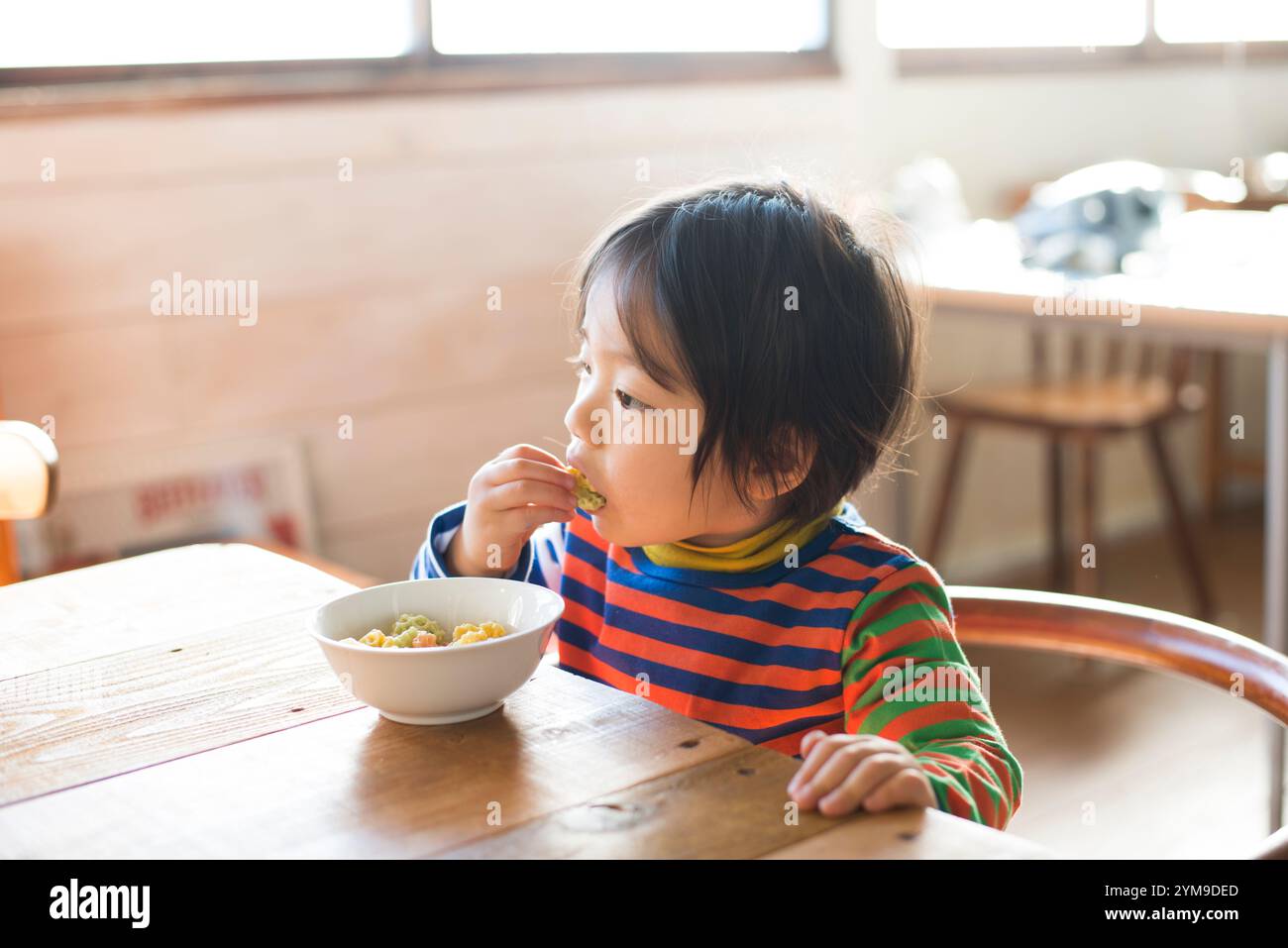 Boys eating a snack Stock Photo - Alamy