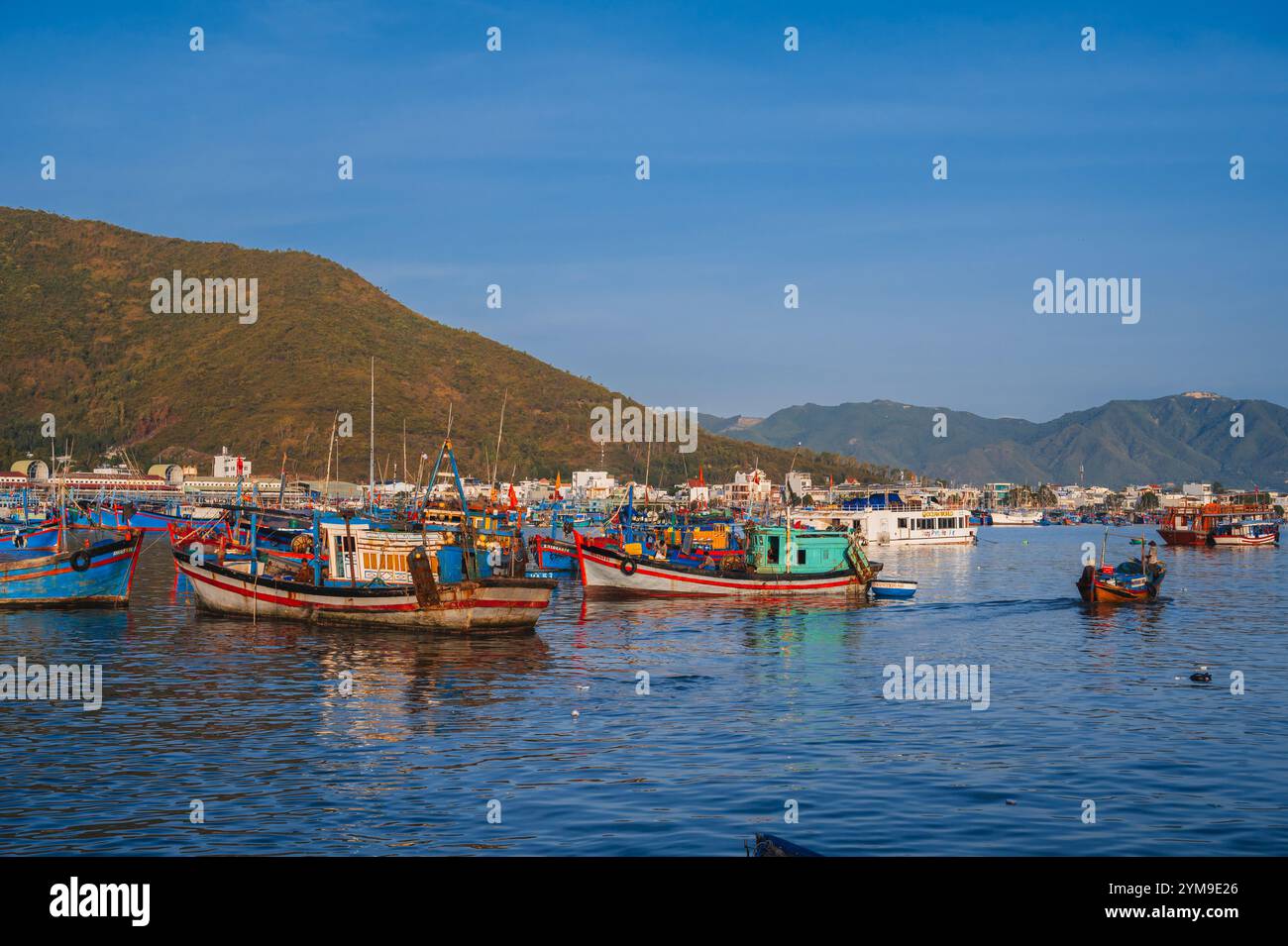 Vietnamese fishing boats and ships in harbor at sea at the fishing port ...