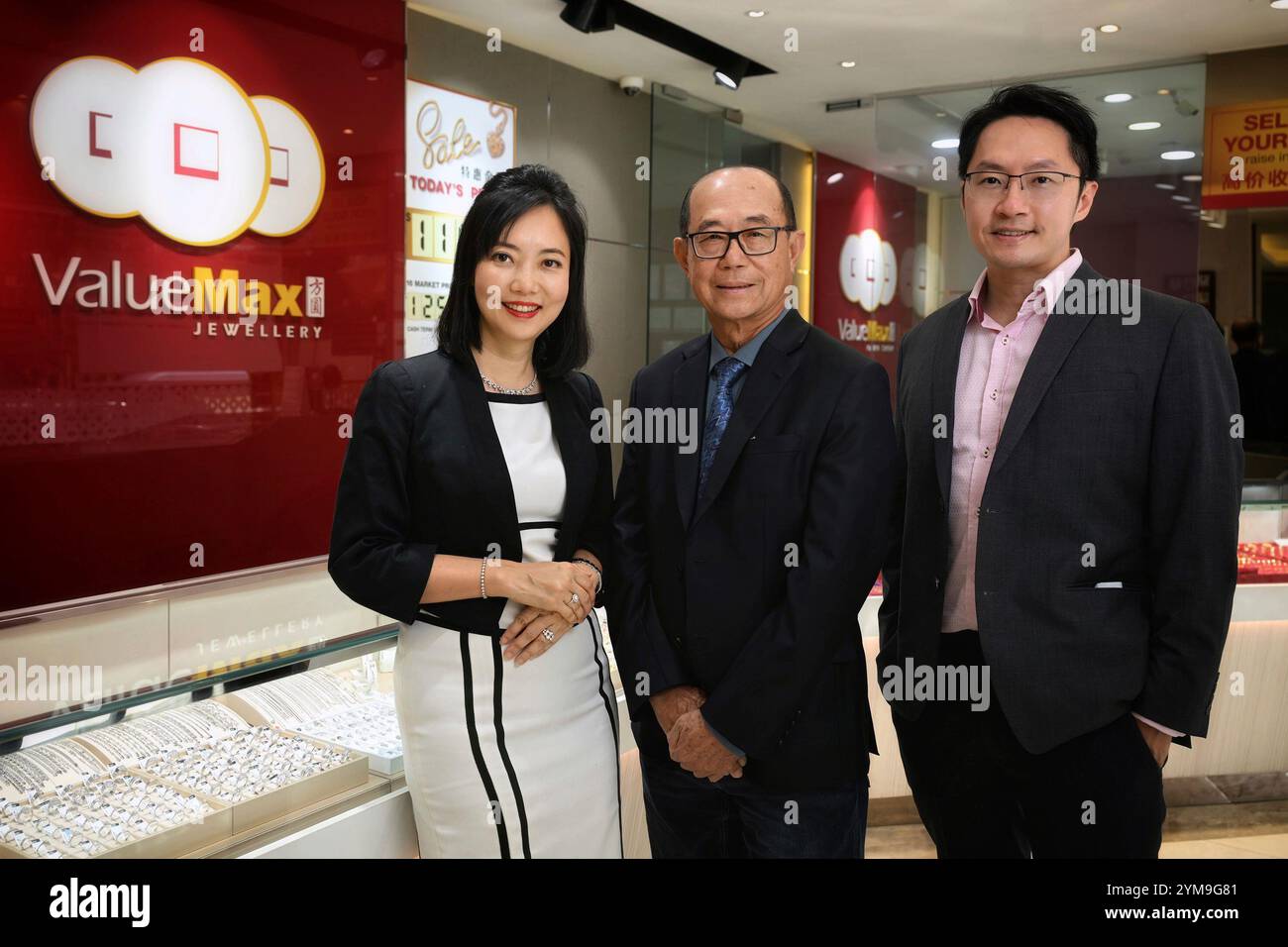 Yeah Hiang Nam (centre), founder and executive chairman, ValueMax Group with his children, Yeah ...