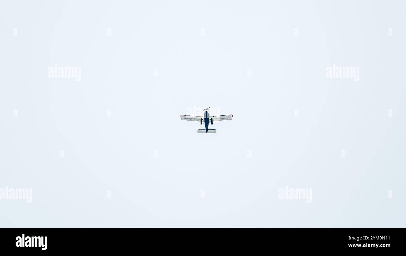 Small ultralight airplane with overhead wing and single propeller ...