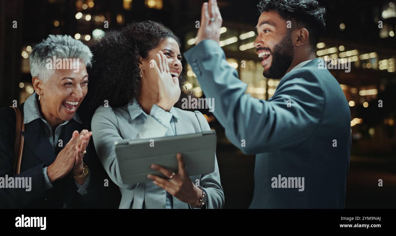 Excited, high five and celebration for colleagues, night and happy for ...