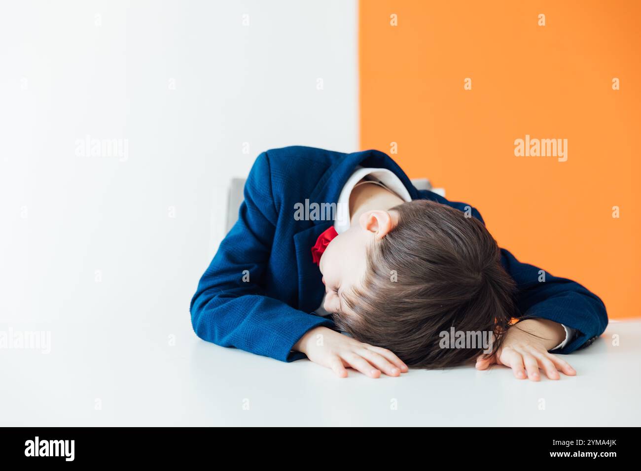 Schoolboy Boy In Business Suit Sleeping Tired Table Stock Photo - Alamy