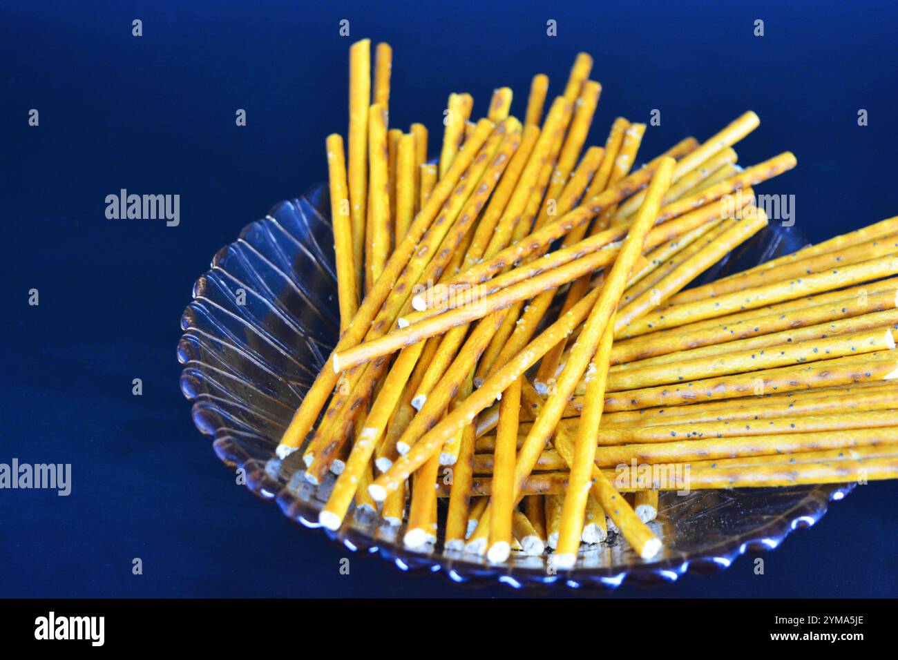 Fast food, food products. Long straws of wheat flour packed in ...