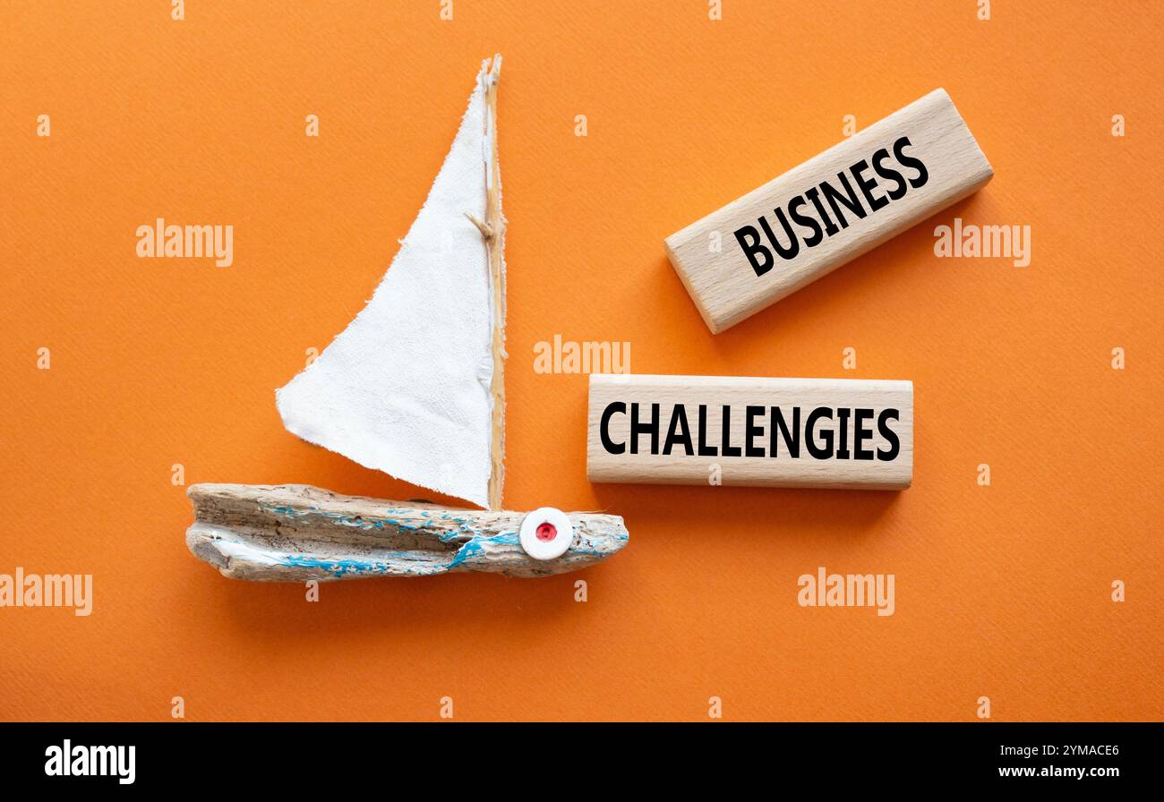 Business challenges symbol. Concept word Business challenges on wooden ...