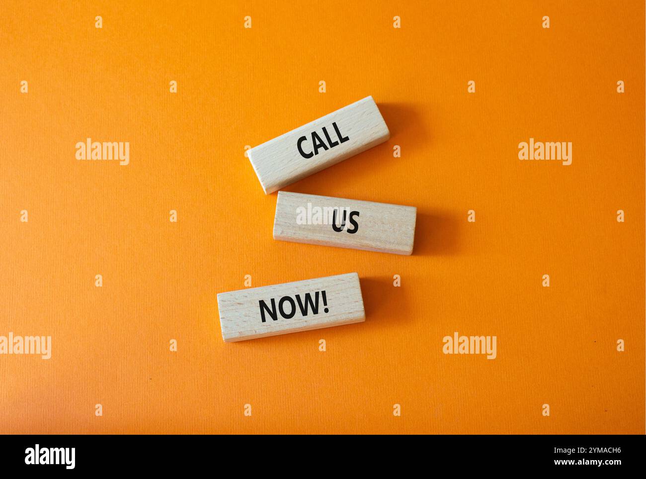 Call us now symbol. Wooden blocks with words Call us now. Beautiful ...