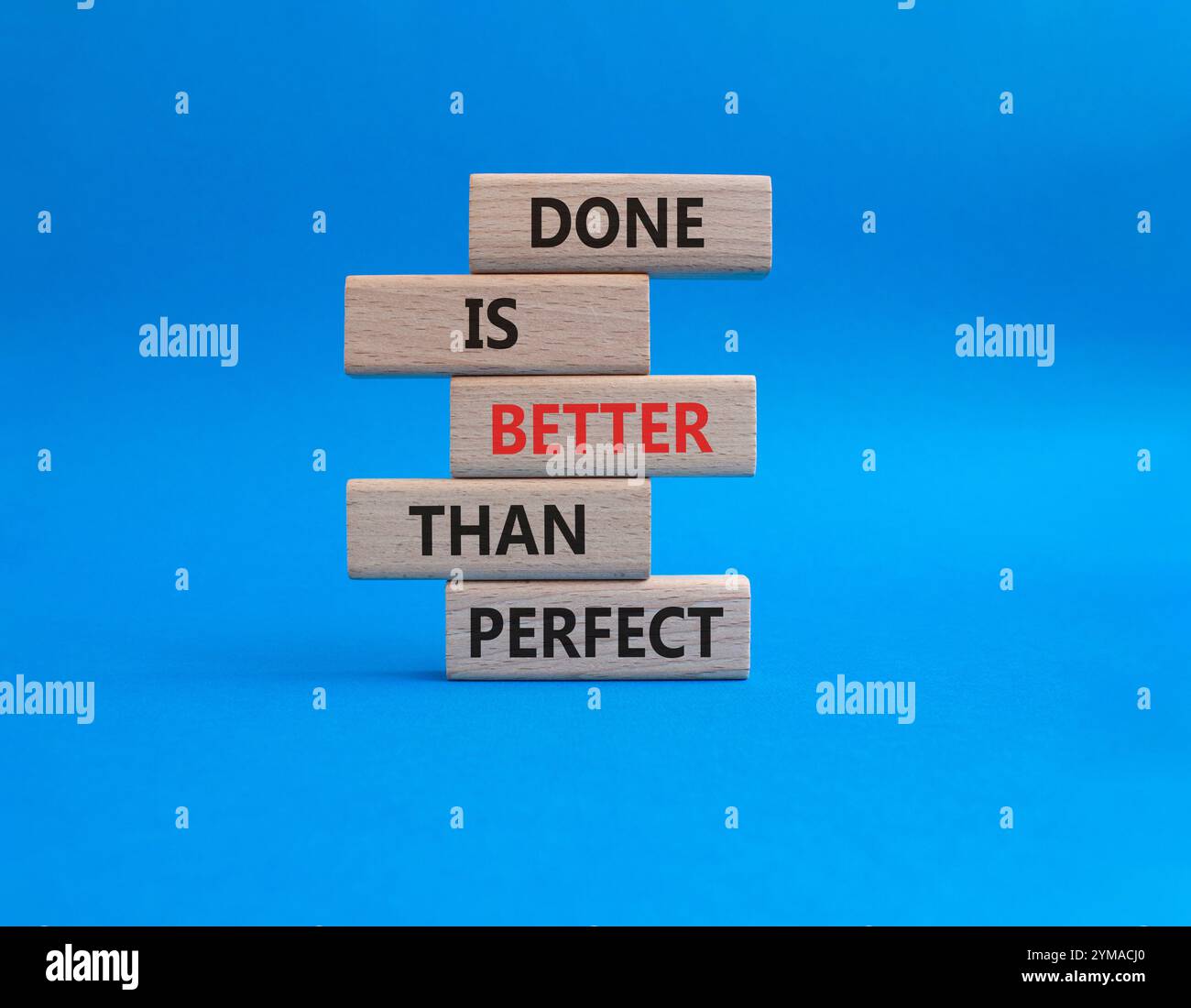 Done is better than Perfect symbol. Wooden blocks with words Done is ...