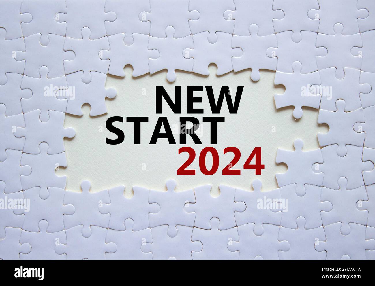 New Start 2024 symbol. Concept words New Start 2024 on white puzzle ...