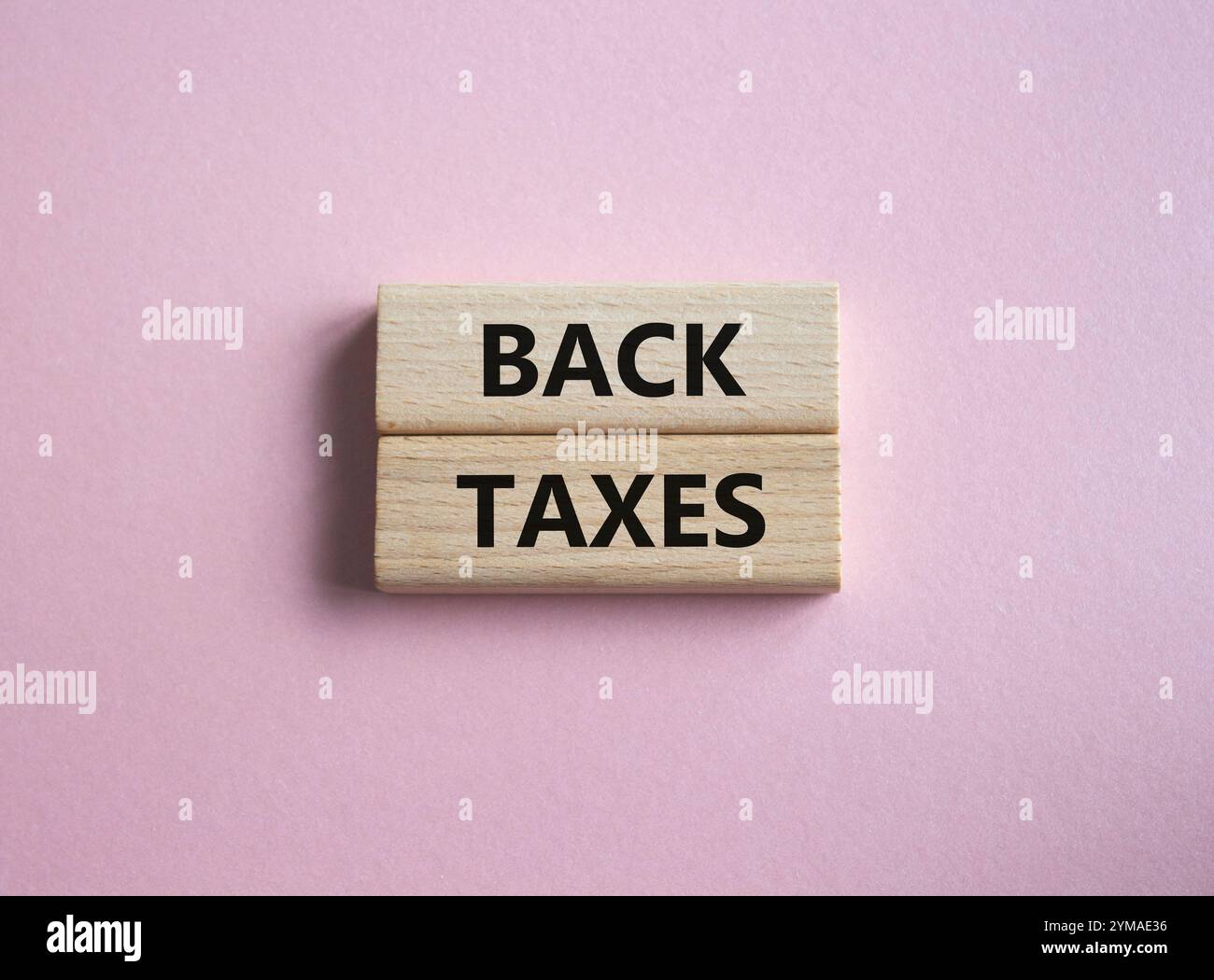Back Taxes symbol. Concept word Back Taxes on wooden blocks. Beautiful ...