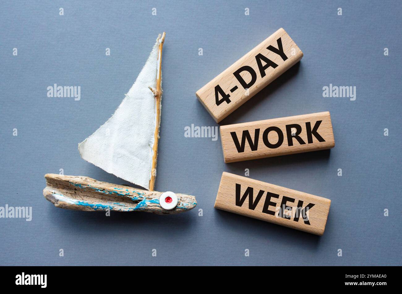 4-day work week symbol. Concept words 4-day work week on wooden blocks ...